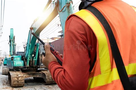 Engineers Use Radio Communication Devices To Control The Operation Of