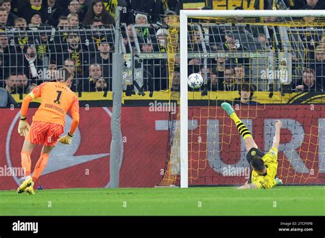 Niklas Sule Of Borussia Dortmund Makes A Save During The Uefa Champions