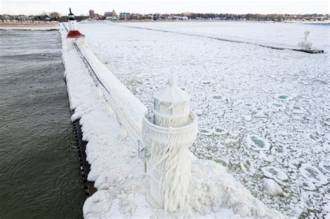 Drone Video Captures Iconic Lake Michigan Lighthouses Covered In Ice