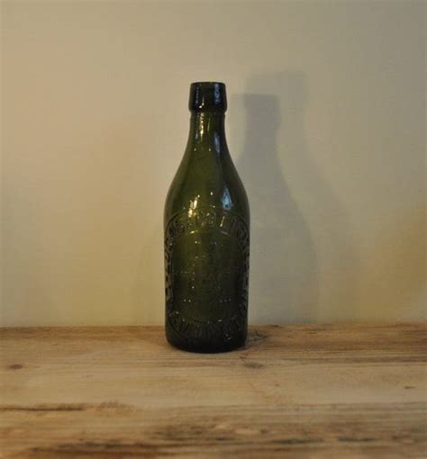 Antique Dark Green Glass Bottle Lucas And Co By Thevintagecoopuk