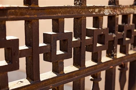 Premium Photo Metal Gate With Geometric Patterns