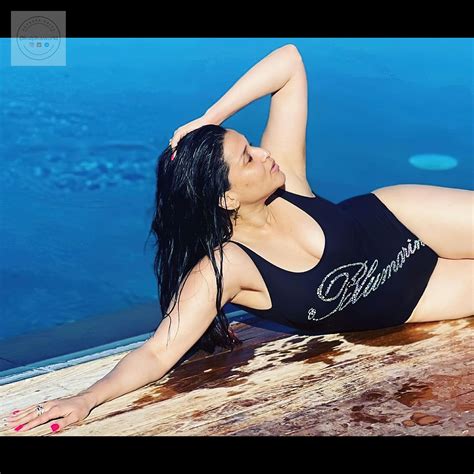 Mannara Chopra extremely hot in black swimsuit : r/kalpikaworld