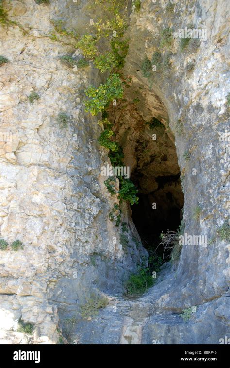 Cave Entrance In Limestone Cliff Vall De Laguart Benimaurell