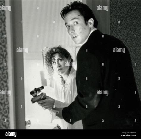 Actors Minnie Driver And John Cusack In The Movie Grosse Pointe Blank