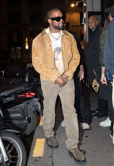 Kim Kardashian Assiste Au Défilé Yeezy Avec Sa Fille North West