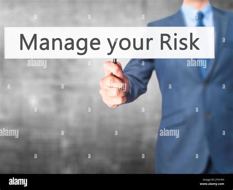 Manage Your Risk Businessman Hand Holding Sign Business Technology