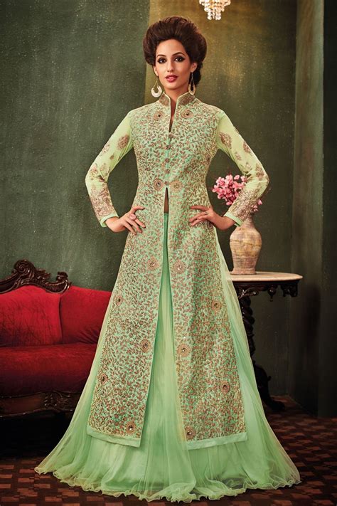Pistachio Green And Gold Raw Silk And Net Tantalizing Lehenga With Long