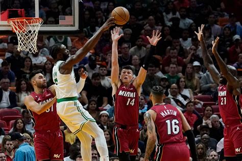 Tatum And Brown Combine For 57 Celtics Top Heat 111 104