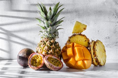 Premium Photo Fruits Pineapple Mango And Passion Fruit