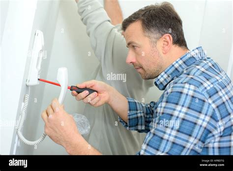 Repairing An Intercom Handset Stock Photo Alamy