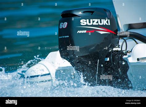 New 2009 Model Of Suzuki Df 60 Outboard Engine On Power Boat Transom