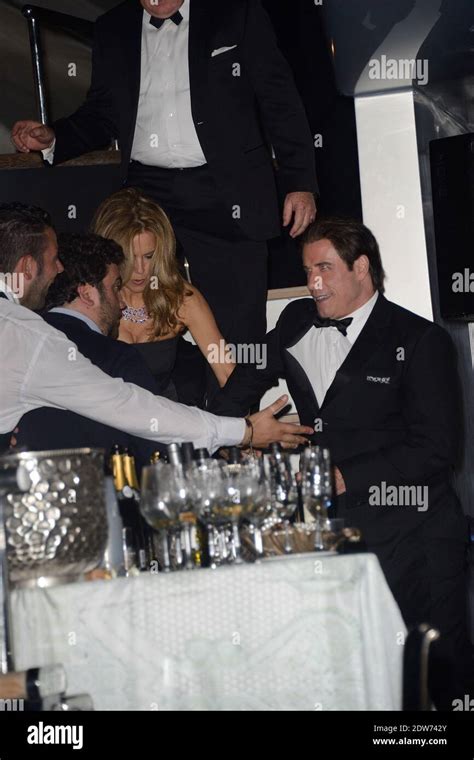 John Travolta And Kelly Preston Attending The Roberto Cavalli Boat