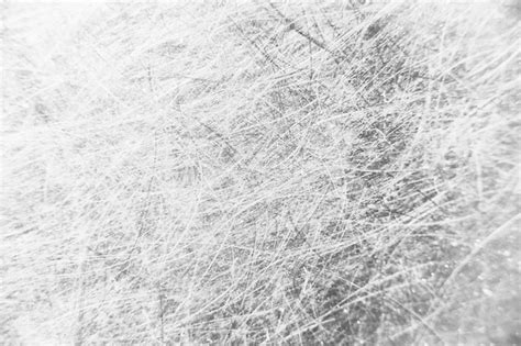 抽象的な軽い傷の背景白い傷の損傷、工業用壁の素材 Premium写真