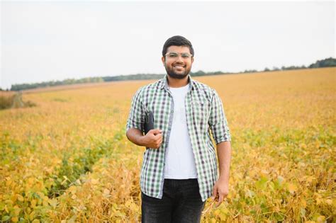 The Concept Of Agriculture An Indian Farmer Or Agronomist Inspects The