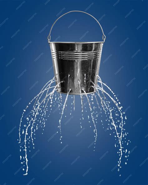 Premium Photo Leaky Bucket With Water On Blue Background