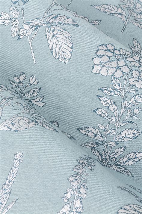Buy Wylder Nature Blue Sophia Floral Jacquard Eyelet Curtains From The