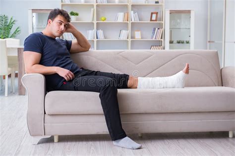 The Man With Broken Leg Recovering At Home Stock Image Image Of