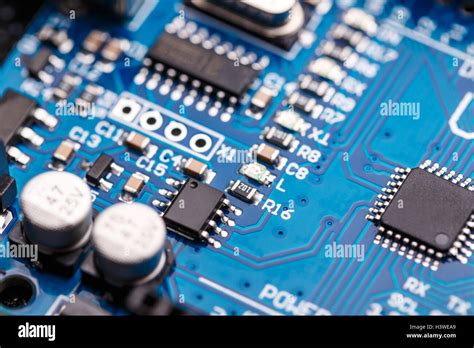 Microprocessor On Blue Circuit Board Representative Of The High Tech Industry And Computer