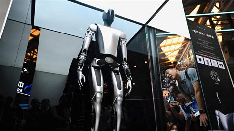 Teslas Roboter Optimus Soll Babysitten Und Gassi Gehen