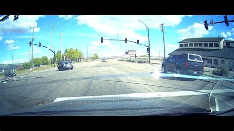 Car Crashes Into Another While Turning At Traffic Signal Youtube