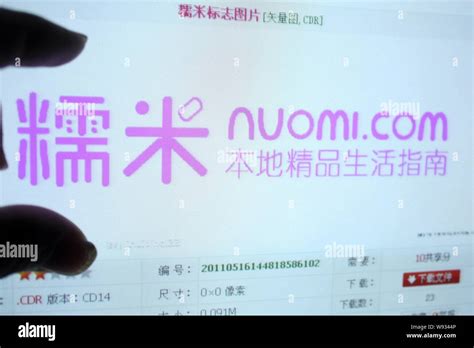 FILE A Chinese Netizen Browses The Online Group Buying Website Nuomi