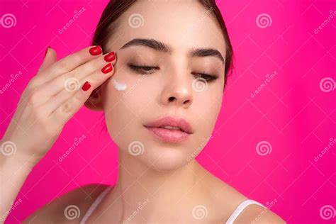 Close Up Facial Cream On Cheek Beauty Portrait Of A Beautiful Half