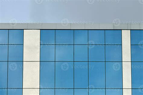 Blue Glass Office Building Wall With Blue Sky Background 26519716 Stock