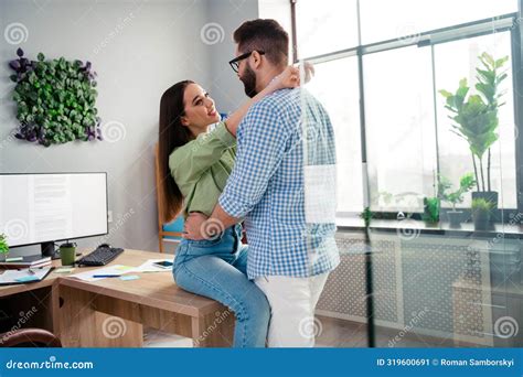 Photo Of Two Colleagues Coworkers Friends Love Each Other Girl Cuddle Man In Workplace Stock