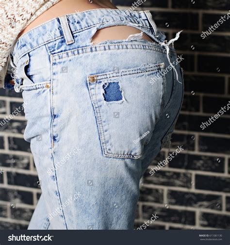Sexy Woman Butt Ripped Jeans ภาพสต็อก 611581130 Shutterstock