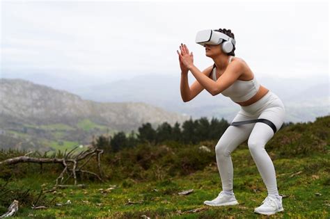 Premium Photo Woman Using Vr Glasses To Exercise Outdoors With