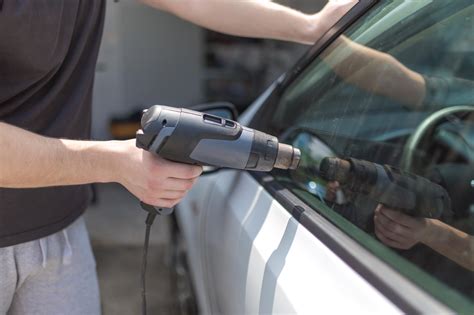 Removing Window Tint A Step By Step Guide In The Garage With