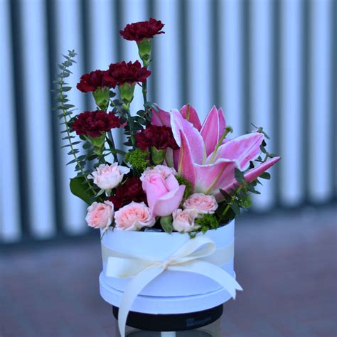 Mixed Roses And Lilly Flowers Arrangement