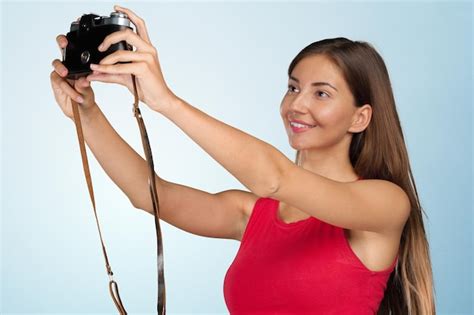 Premium Photo Girl With A Camera