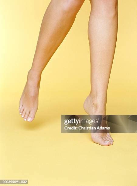 Womans Legs Standing Bare Feet Photos And Premium High Res Pictures