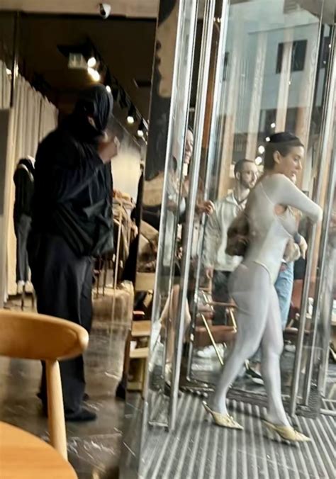 Bianca Censori Sports Sexy Silver Cutouts During Coffee Run With