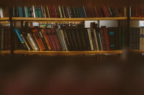 Premium Photo Vintage Bookshelf Filled With Leatherbound Classics A