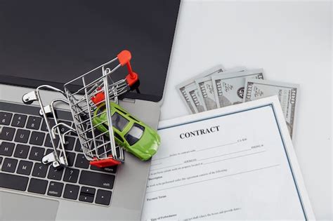 Premium Photo Purchase Contract For A Car With Laptop Money And Toy