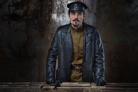 Premium Photo Portrait Of Man Wearing Costume Standing Against Wall