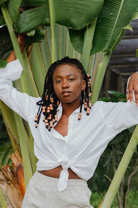 Woman Leaning On A Tree By Stocksy Contributor Maingaila Muvundika