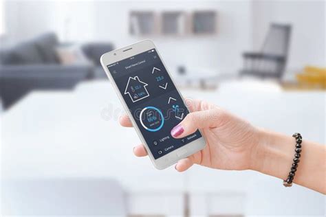 Woman Control Light In Living Room Interior With Smart Home Control App On Modern Mobile Devices