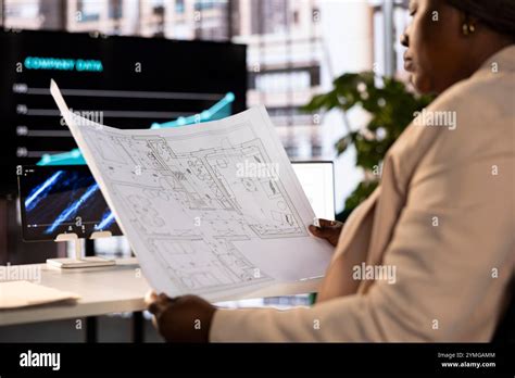 Architect Developing Architectural Plans For Residential Commercial And Industrial Projects