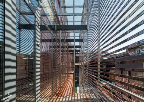 Red Mirrored Lattice Encloses Office Block By Wise Architecture