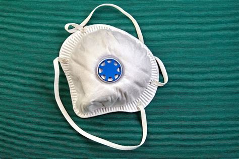 Premium Photo N95 Respirator And Surgical Mask Or Facemask Is Used As
