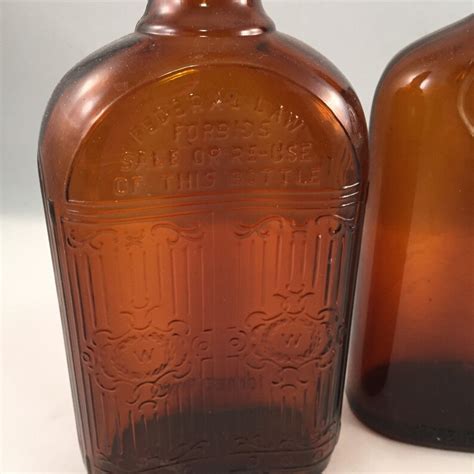 Reduced Antique Vintage Brown Glass Bottles With Metal Etsy