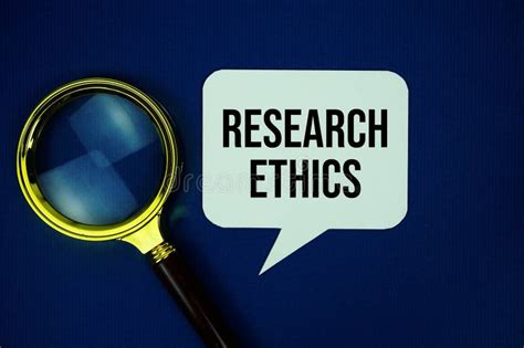 Research Ethics Text On Speech Bubble With Magnifying Glass Top View On