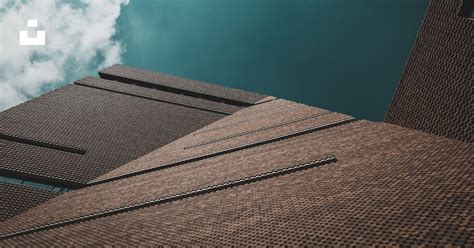 Foto Zum Thema 낮 동안 갈색 콘크리트 건물의 벌레 눈보기 Kostenloses Bild Zu Pont Auf