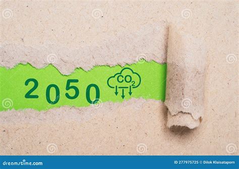 Co2 Reducing Icon With 2050 On Green Torn Paper For Decrease Co2 Carbon Footprint And Carbon