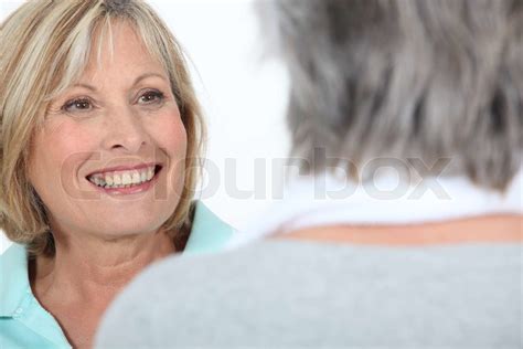 Two Mature Women Talking Stock Image Colourbox