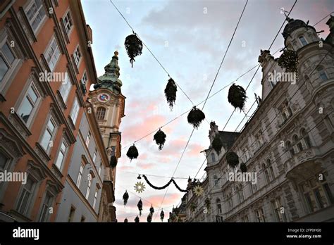 Sunset Cityscape With Baroque Style Buildings And Christmas Decorations