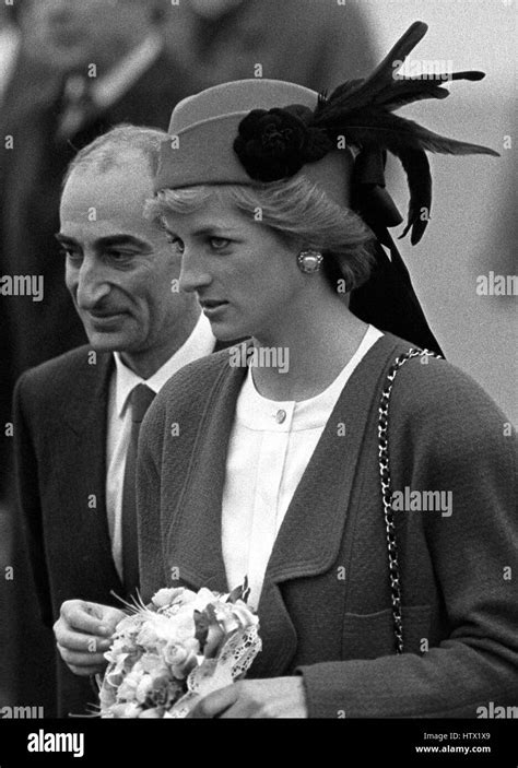 The Princess Of Wales Wearing A Chanel Red Wool Coat With Gold Buttons Topped With A Red Hat